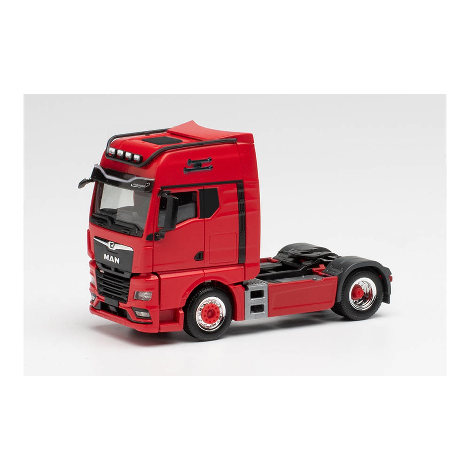 Herpa 313711 MAN TGX GX Individual Lion Zugmaschine, rot Maßstab 1:87